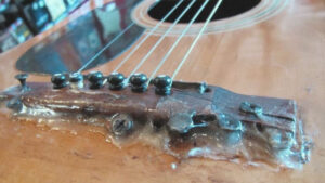 7-Step Simple Guide to Repairing Acoustic Guitar Bridges - Kids Guitar ...